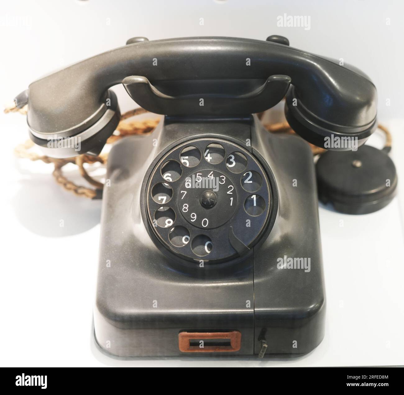 Old black phone with cradle and rotary dial. Nostalgia phone ...