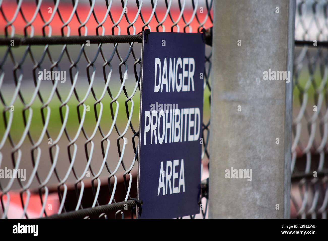 Warning sign at Silverstone Historic Festival Stock Photo - Alamy