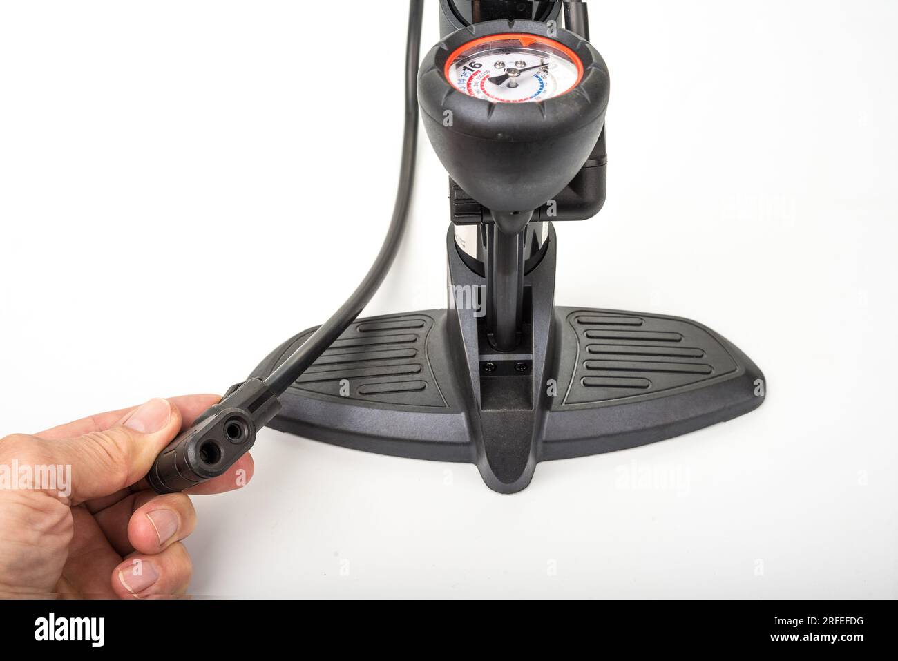 Bicycle and car hand pump on a white Stock Photo - Alamy