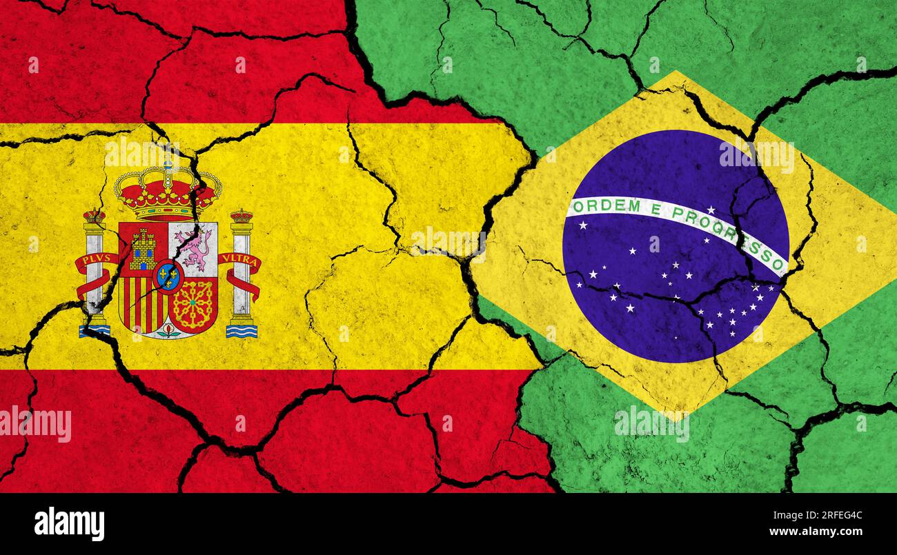 Flags of Spain and Brazil on cracked surface - politics, relationship ...