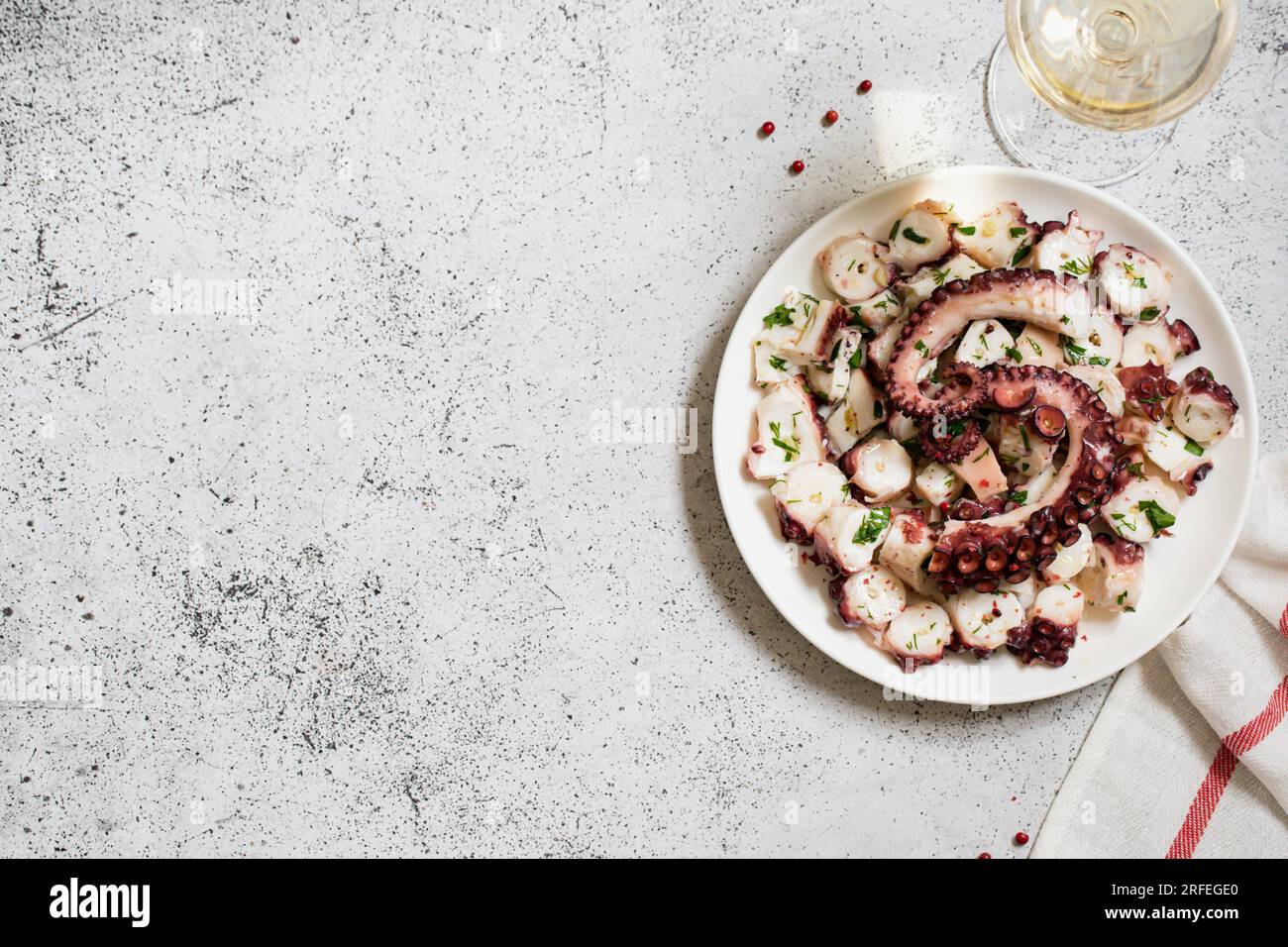 boiled chopped octopus on a concrete table Stock Photo - Alamy