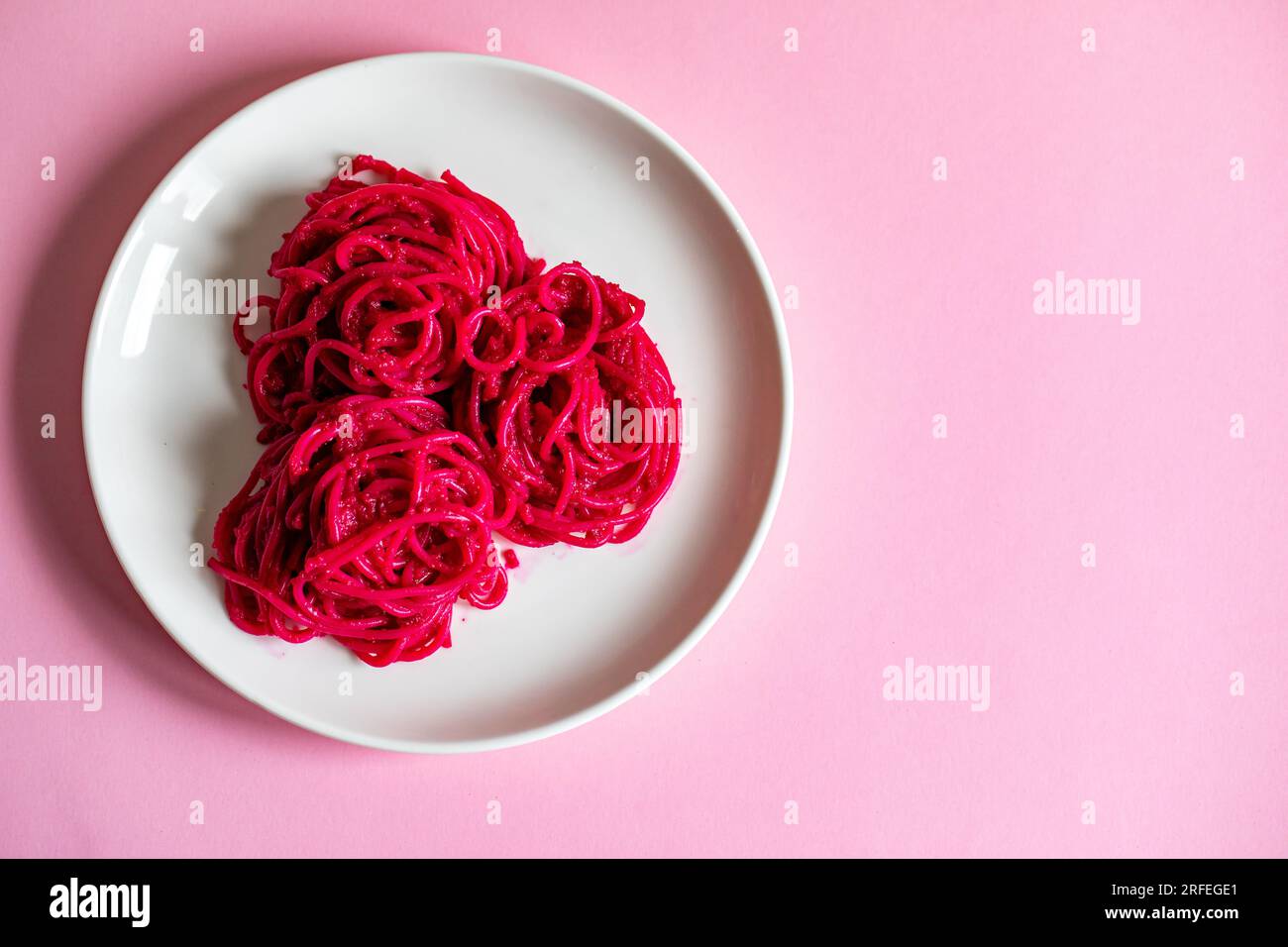 Beetroot Pasta, Barbie Themed Pasta. Pink noodles on pink background ...