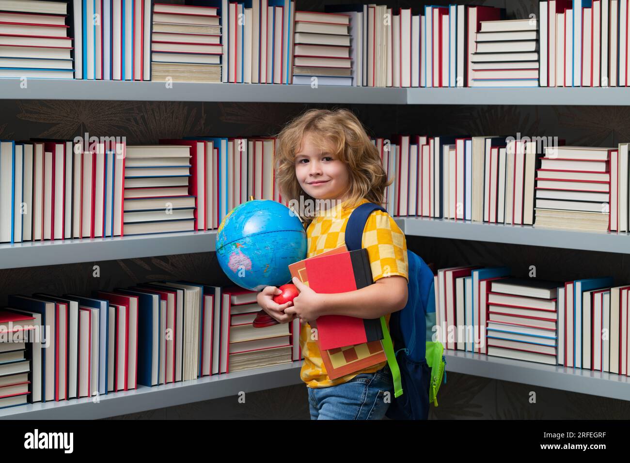 School boy with world globe and books. School kid student learning ...