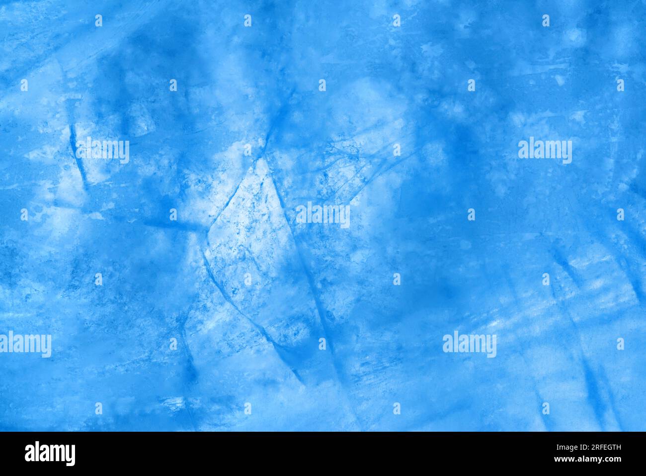 Blue ice texture with cracks, close-up, backdrop Stock Photo - Alamy