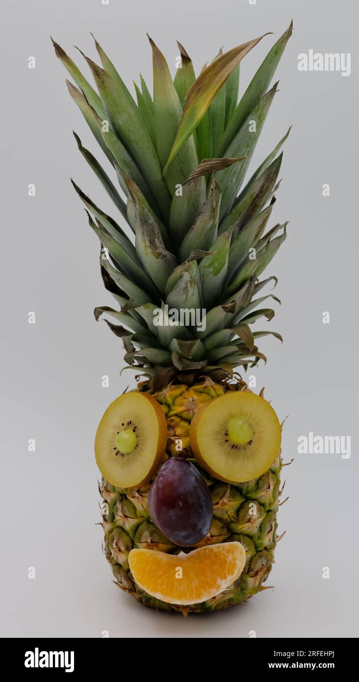 Pineapple with other Fruits Pineapple forming a smiling face Stock ...