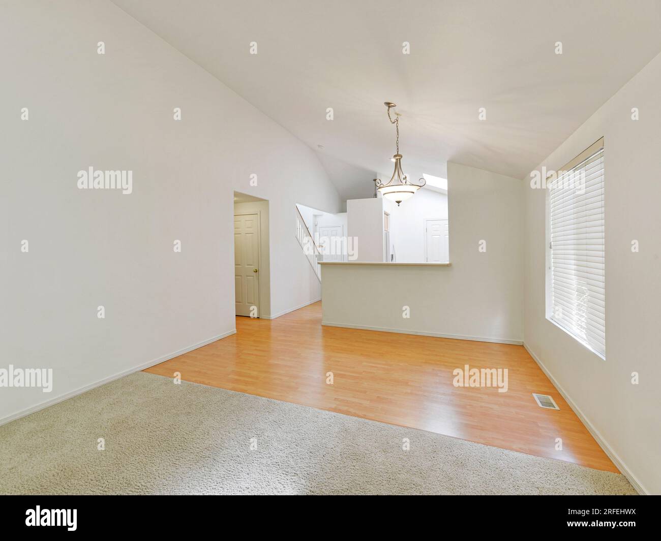 Modern residential empty living room, dining room and kitchen interior ...