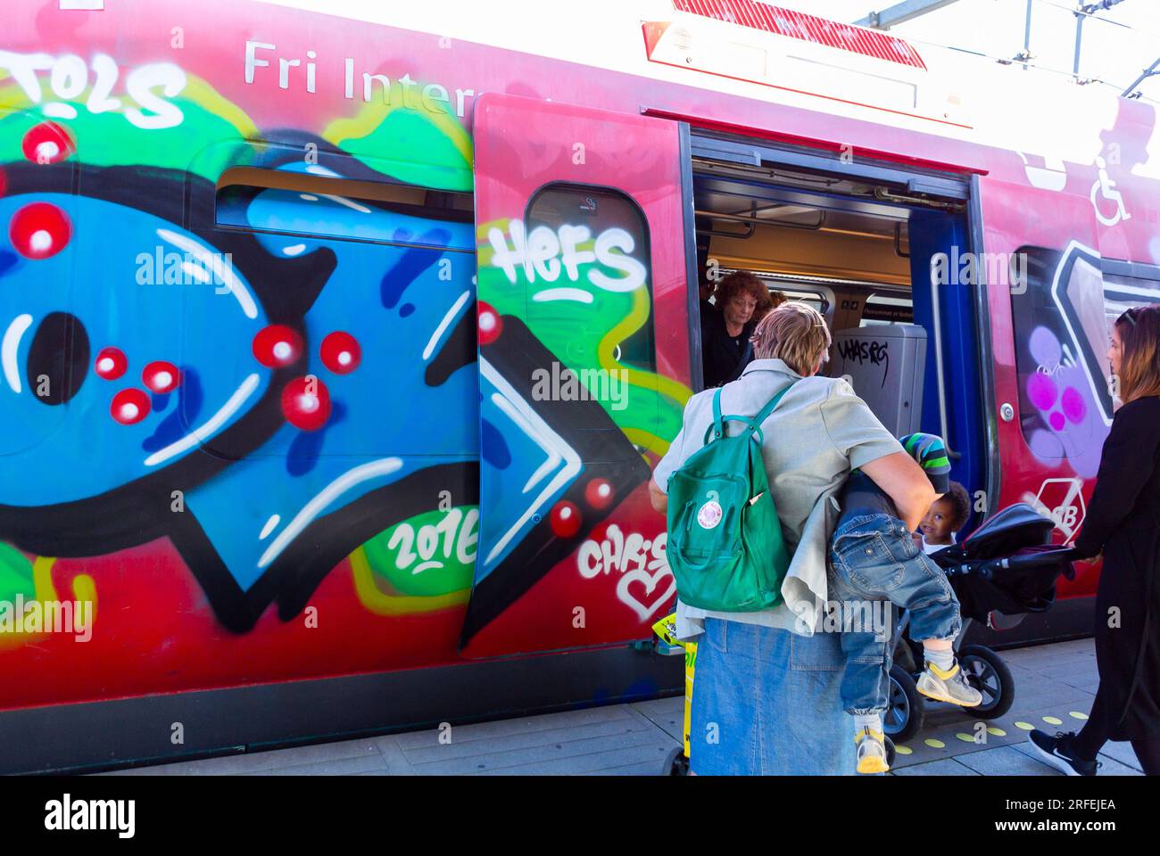 Copenhagen, Denmark, People, Passengers, Mother and Child, Boarding on ...