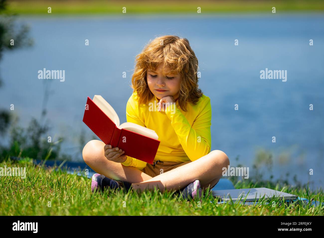 Kid read a book. Early education for kids. Summer vacation with reading ...