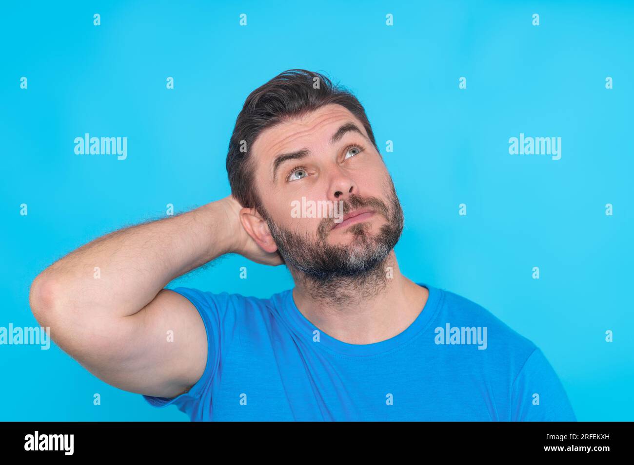 Portrait of thinking man with confused puzzled face on studio isolated ...