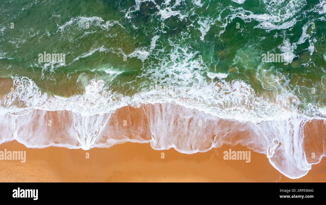 Aerial view of beautiful tropical beach and sea with sand and wave ...