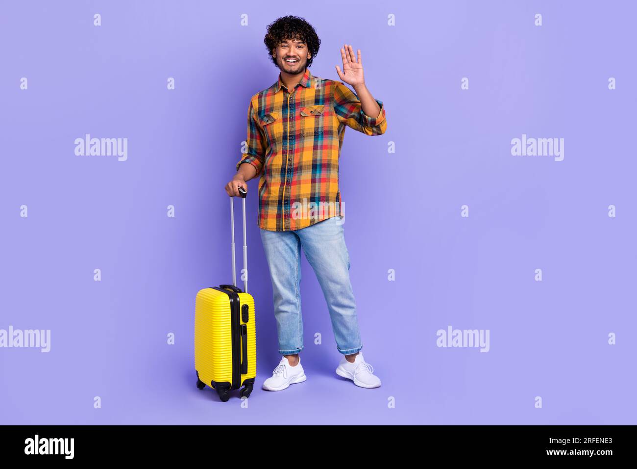 Full body length cadre of young friendly man waving palm hello ...