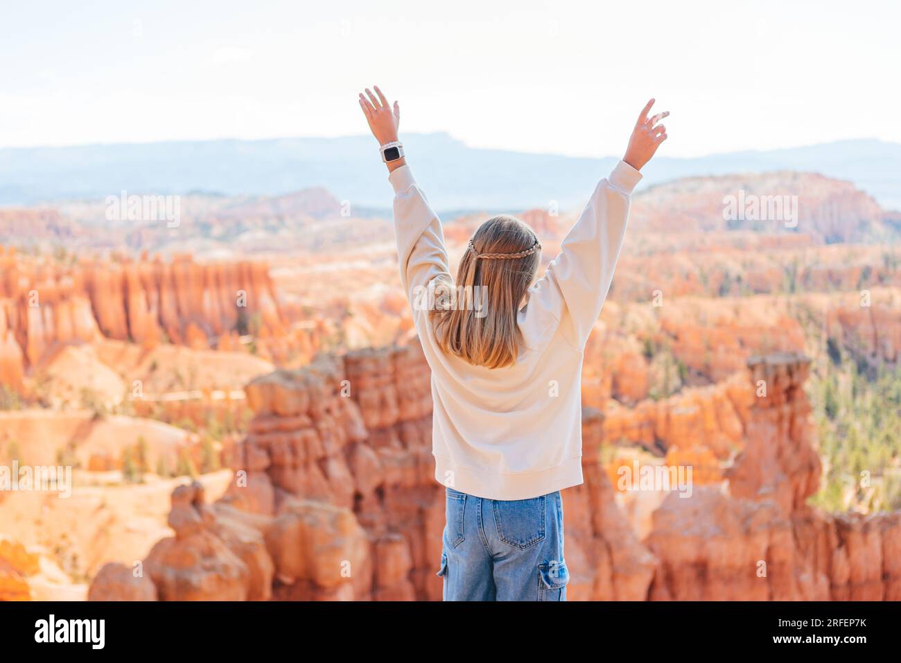Little girl in Bryce Canyon hiking relaxing looking at amazing view ...
