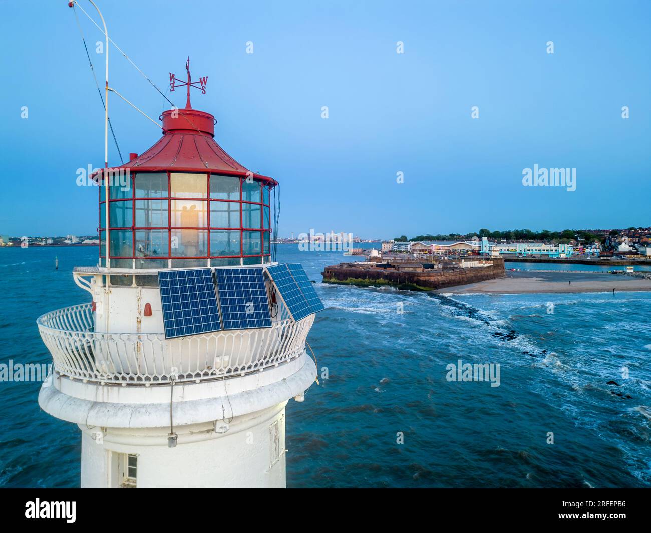 New Brighton lighthouse and Fort Perch Rock at dusk, Wirral, Merseyside ...