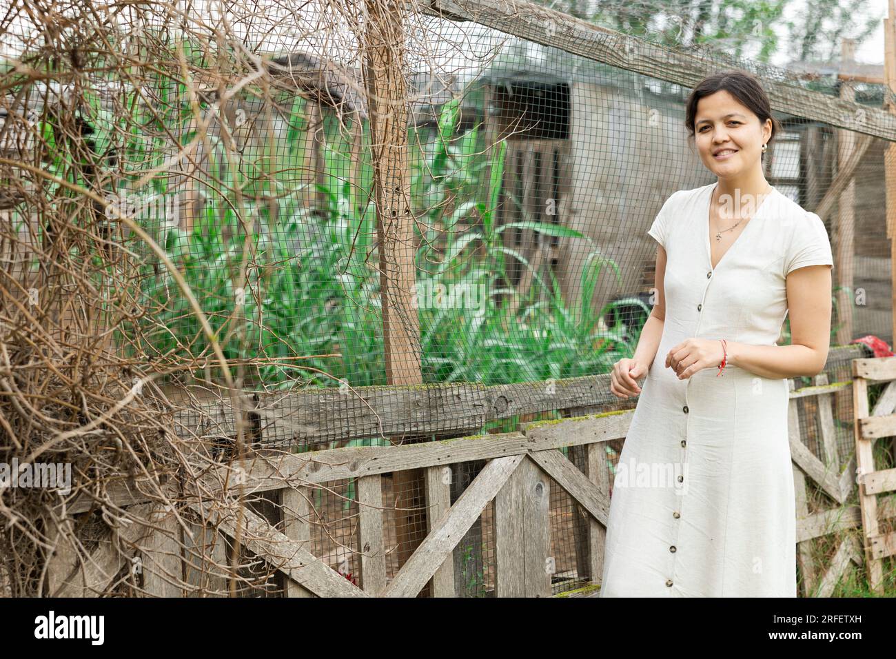 Asian woman at farm Stock Photo - Alamy