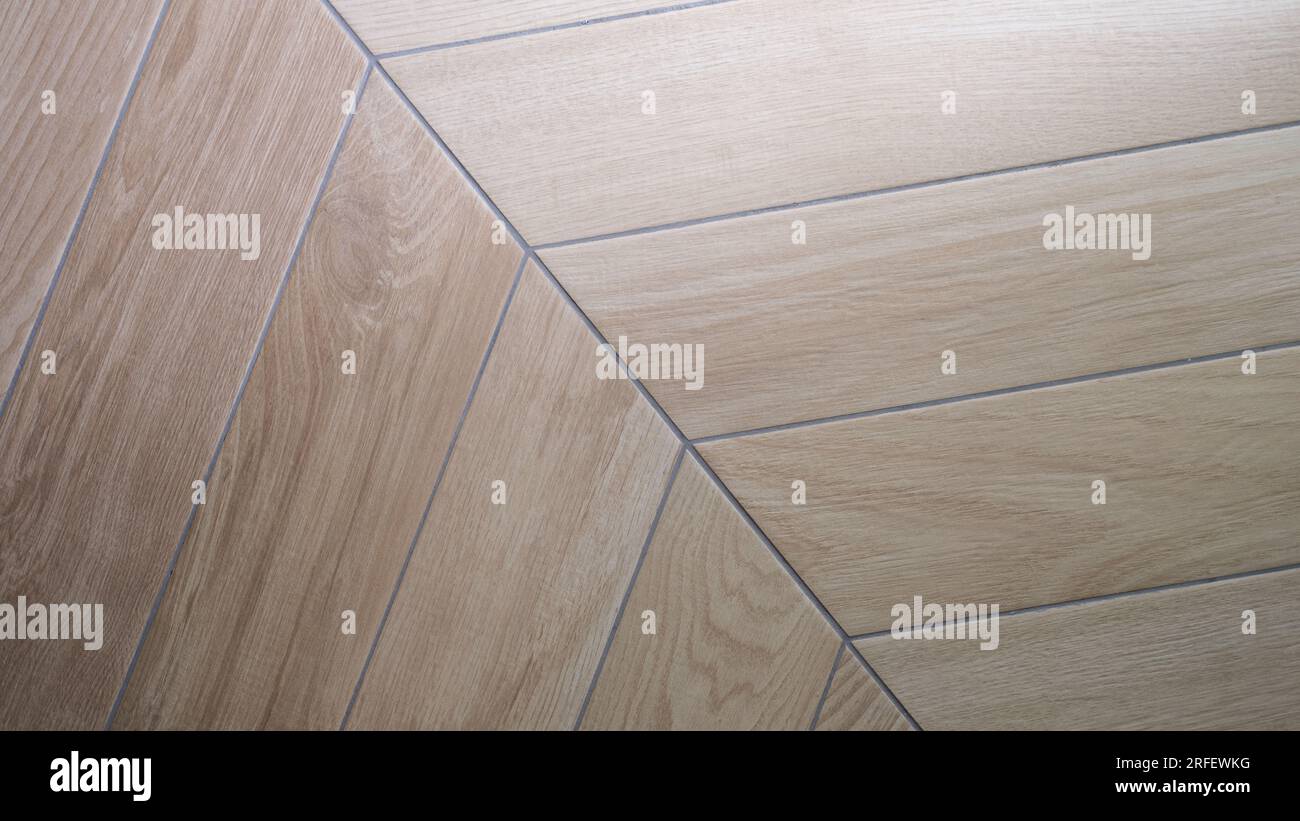 Wooden laminate or parquet in interior Stock Photo - Alamy