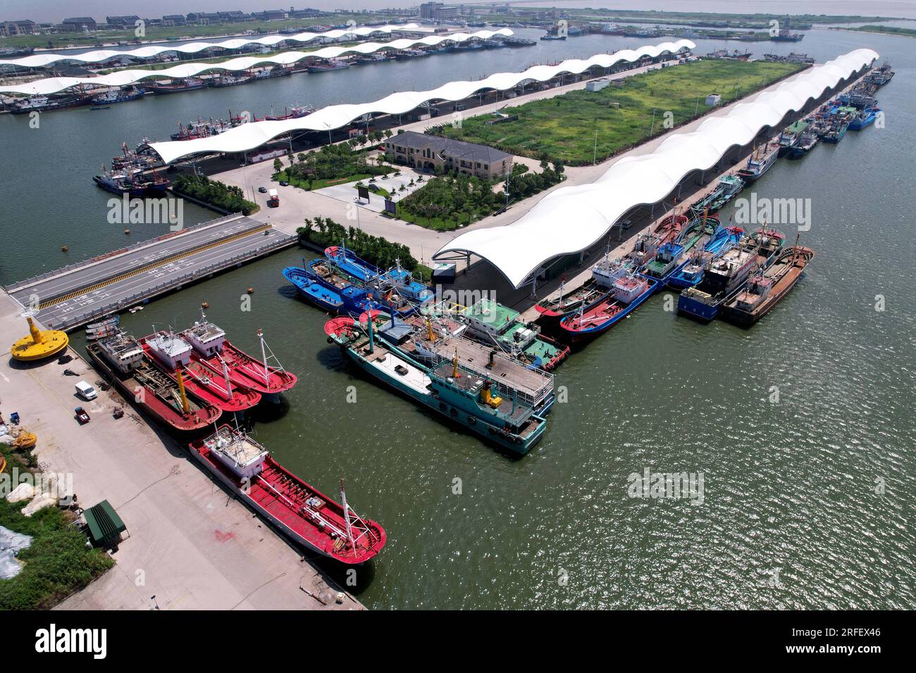 Aerial photo shows fishing boats taking shelter from the approaching ...