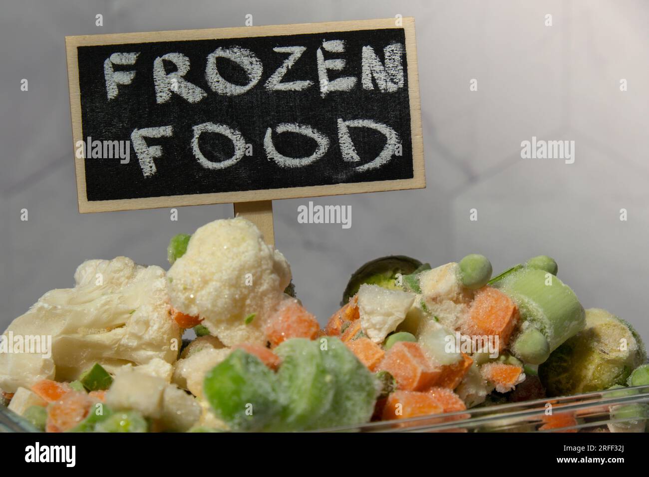 Frozen mixed vegetables for long-term storage with blackboard label and ...