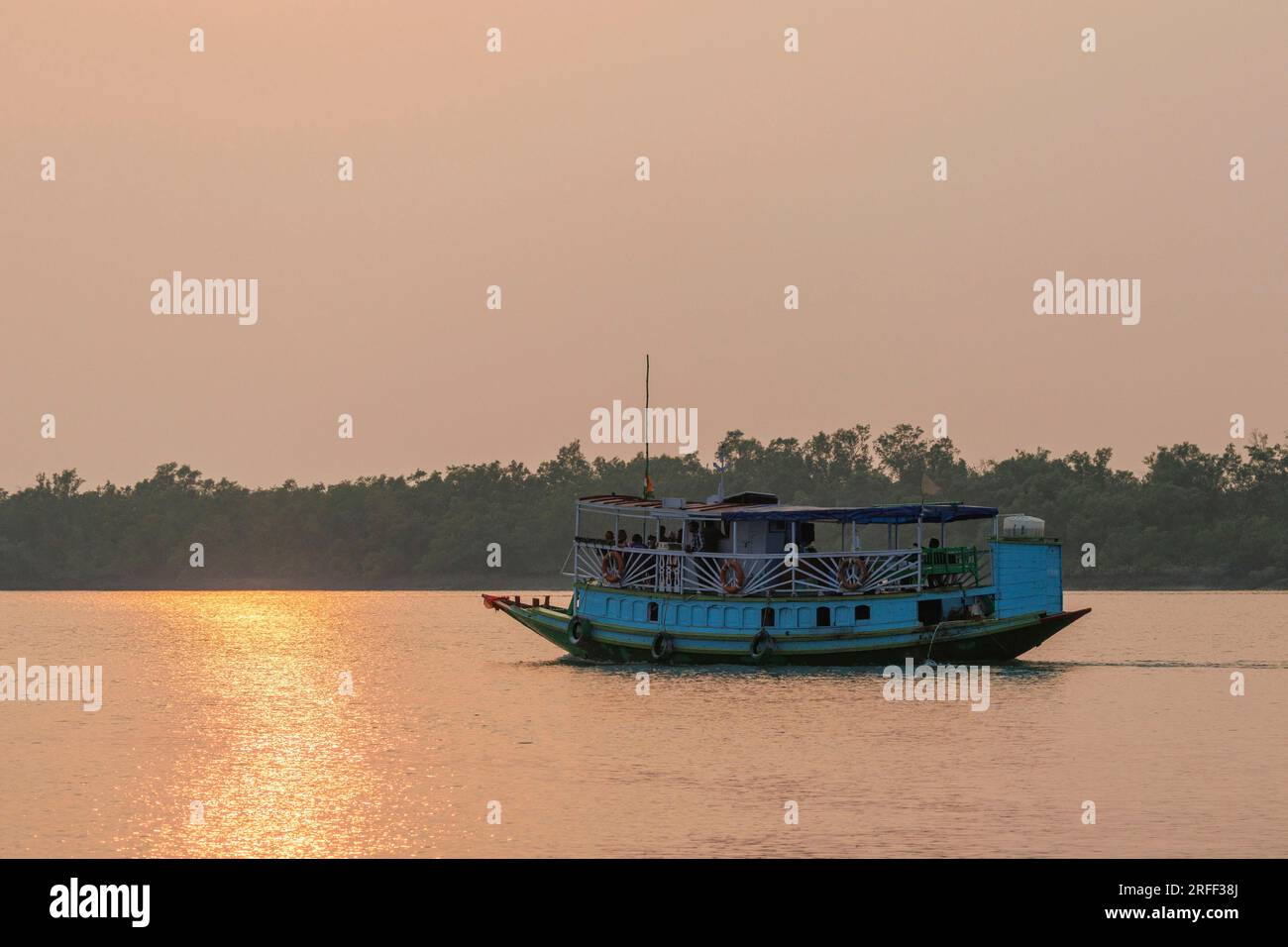 Tourist boat in an inlet of the Sunderbans, Ganges Delta, Bay of Bengal ...