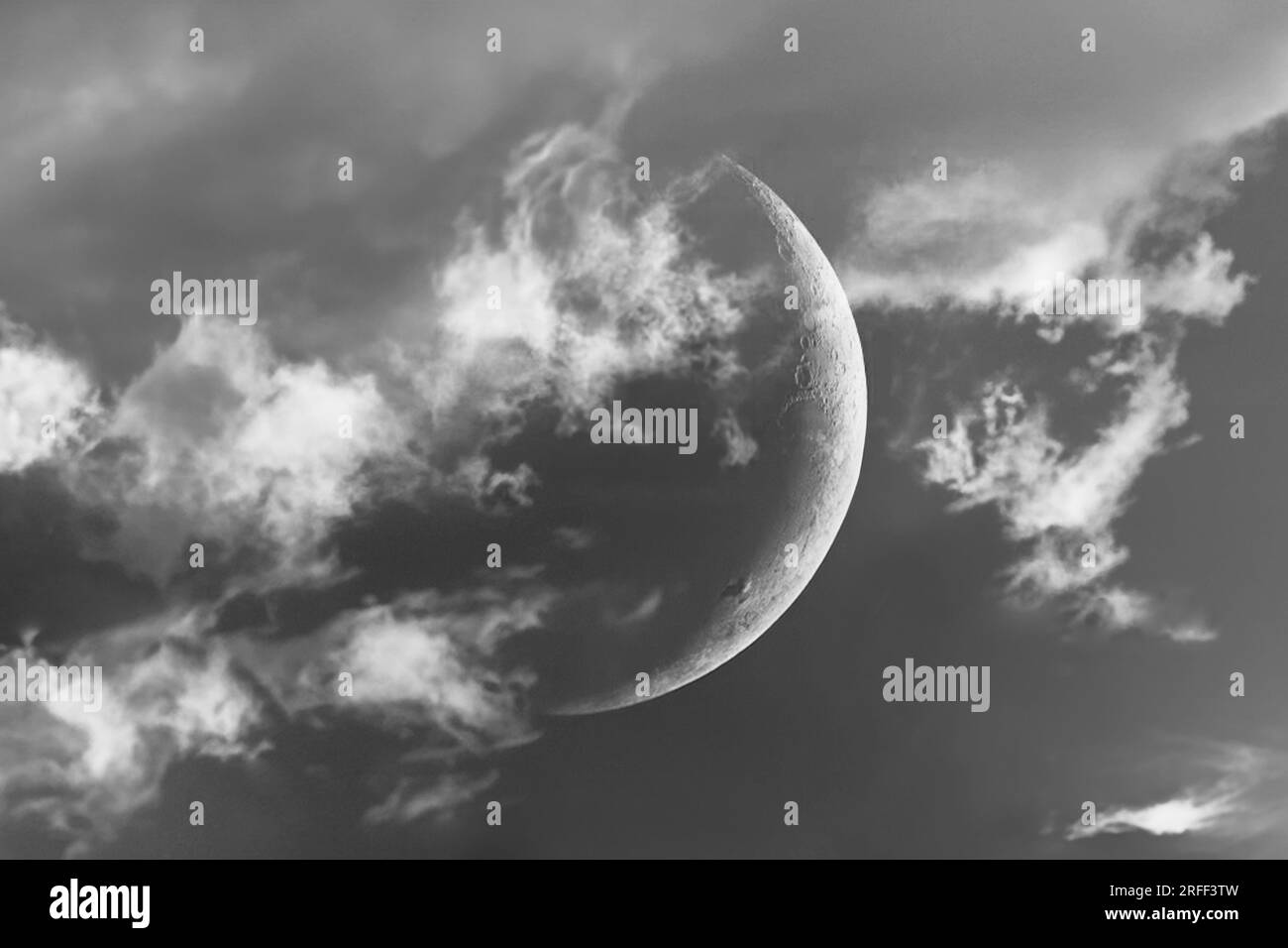 The moon hidden by clouds Stock Photo - Alamy