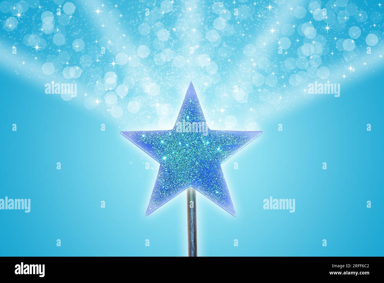 A vibrant blue magic wand emitting glowing magic particles into a blue ...