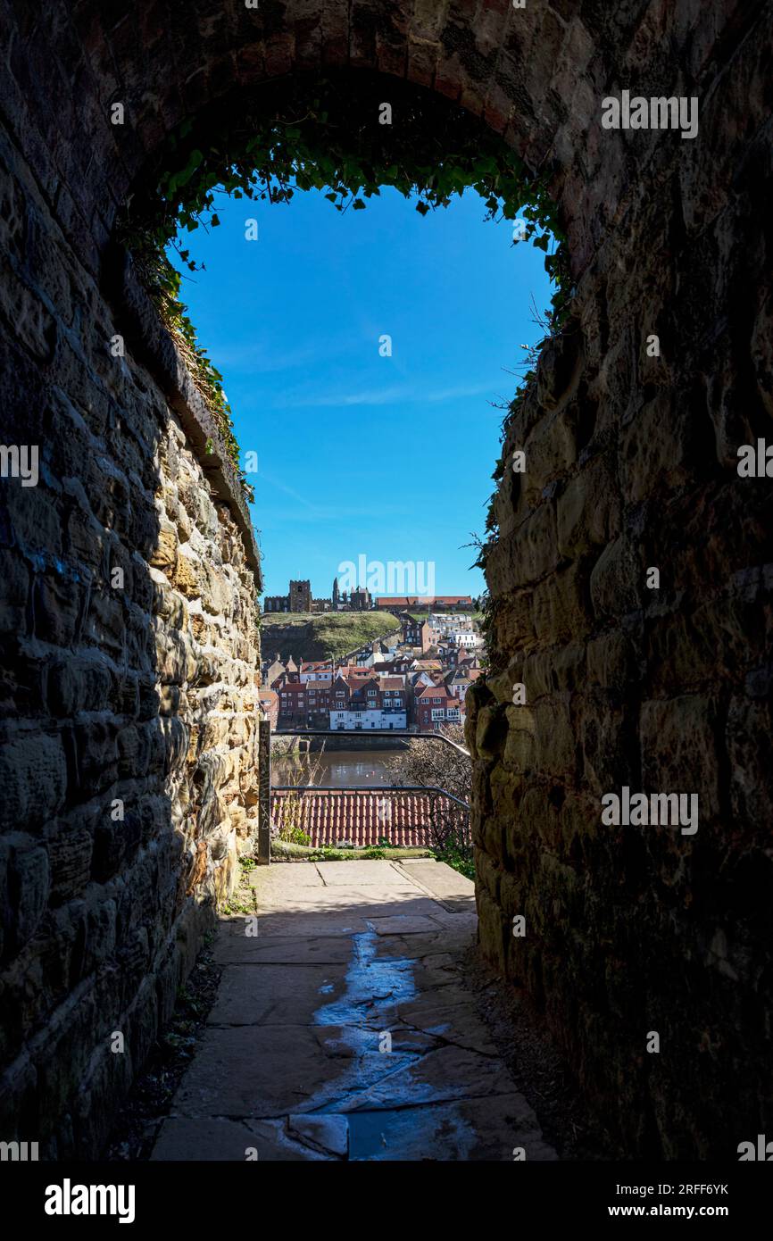 Whitby tunnel, opening out to see the Abbey and church across the ...