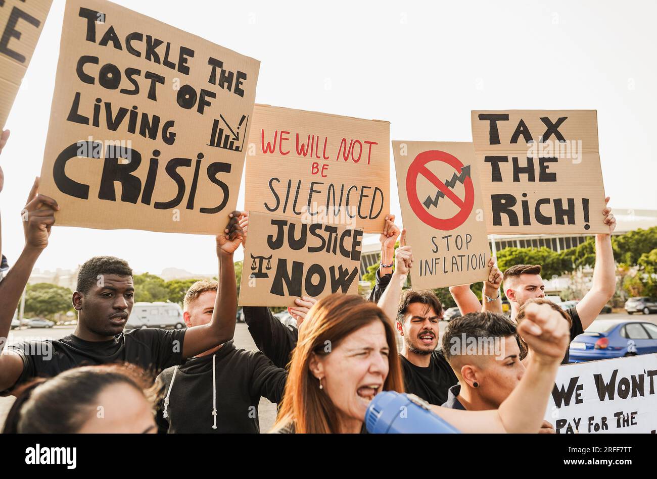 Crowd of multiracial people protest against inflation and financial ...