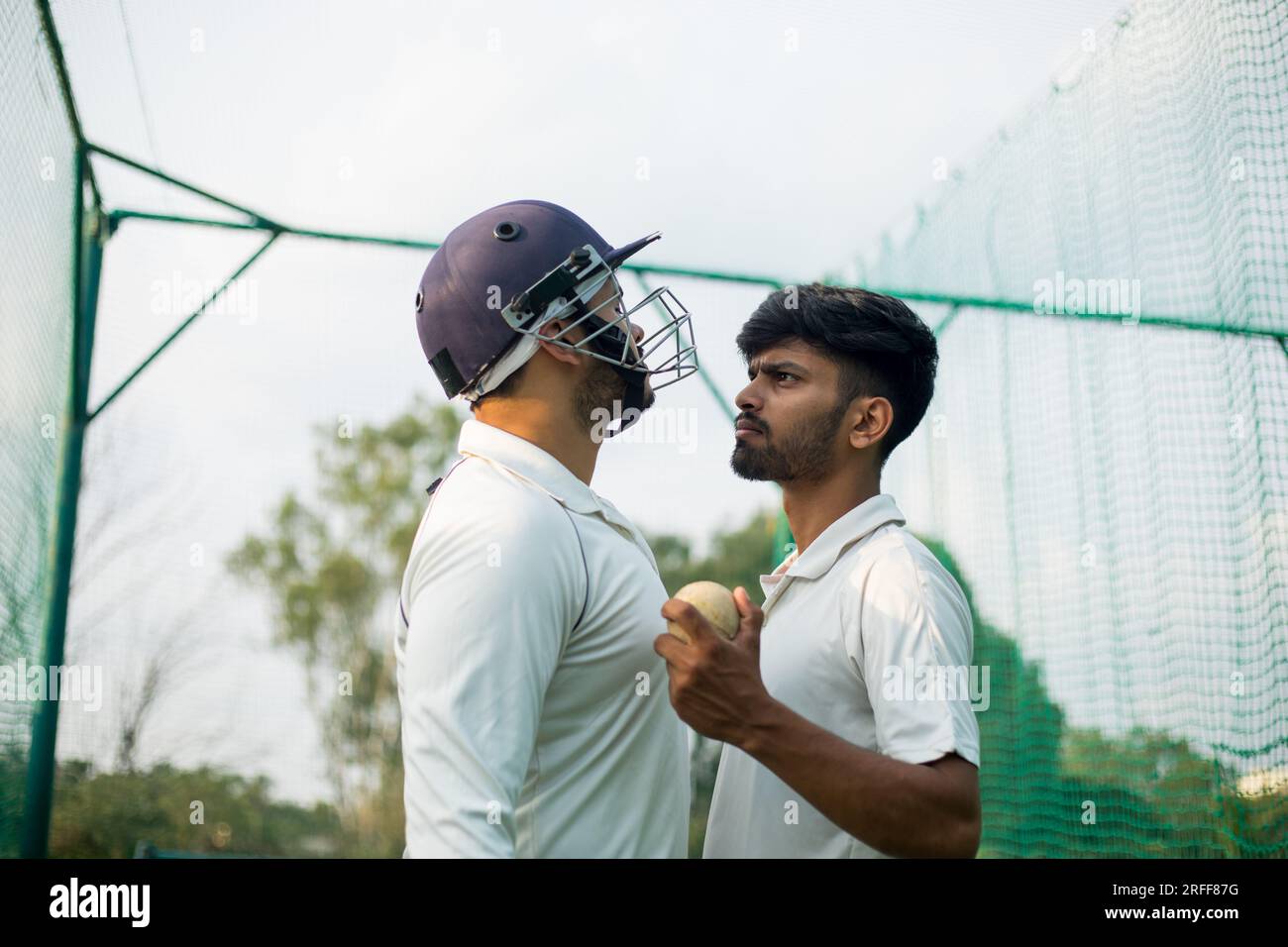Batsman is angry with the bowler while playing cricket Stock Photo - Alamy