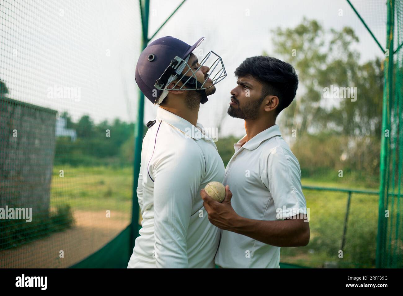 Batsman is angry with the bowler while playing cricket Stock Photo - Alamy