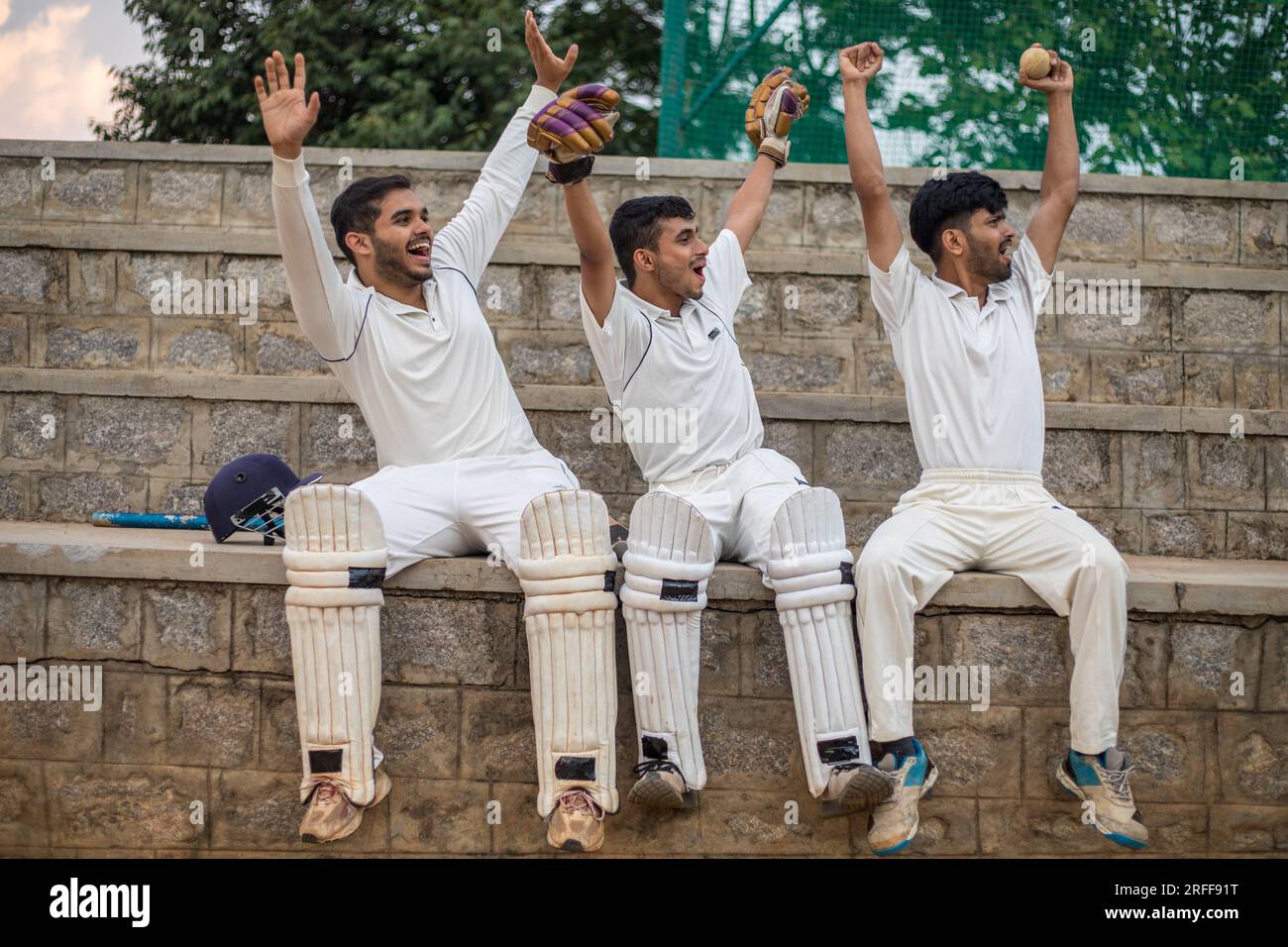 Cricket players encouraging their teammates during cricket match at the ...