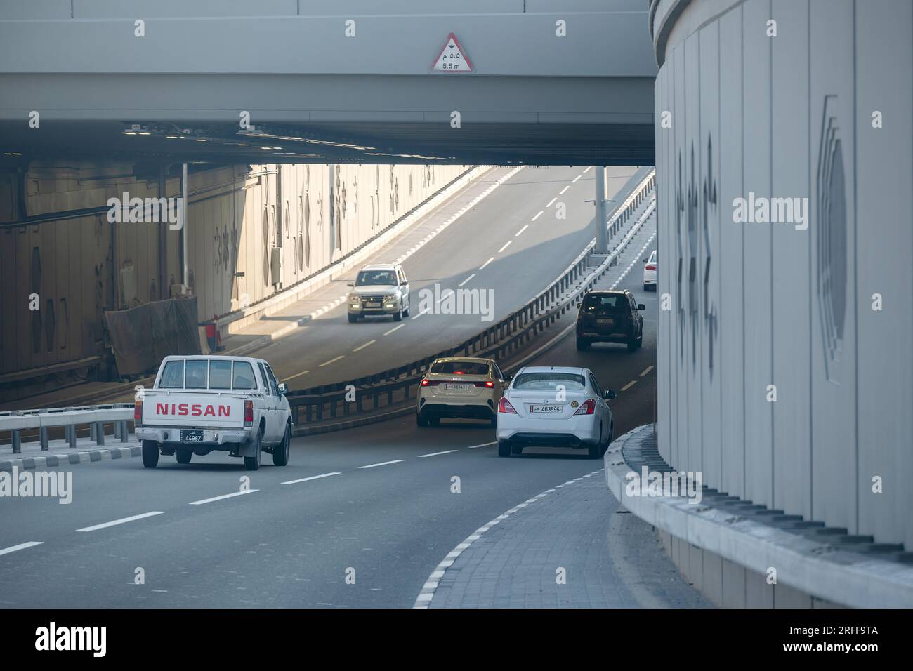 Corniche Road. Traffic passing through under pass Stock Photo - Alamy