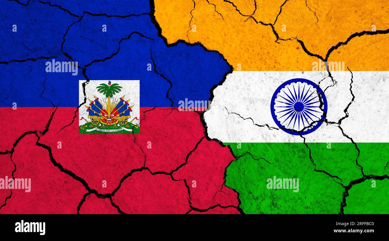 Flags of Haiti and India on cracked surface - politics, relationship ...