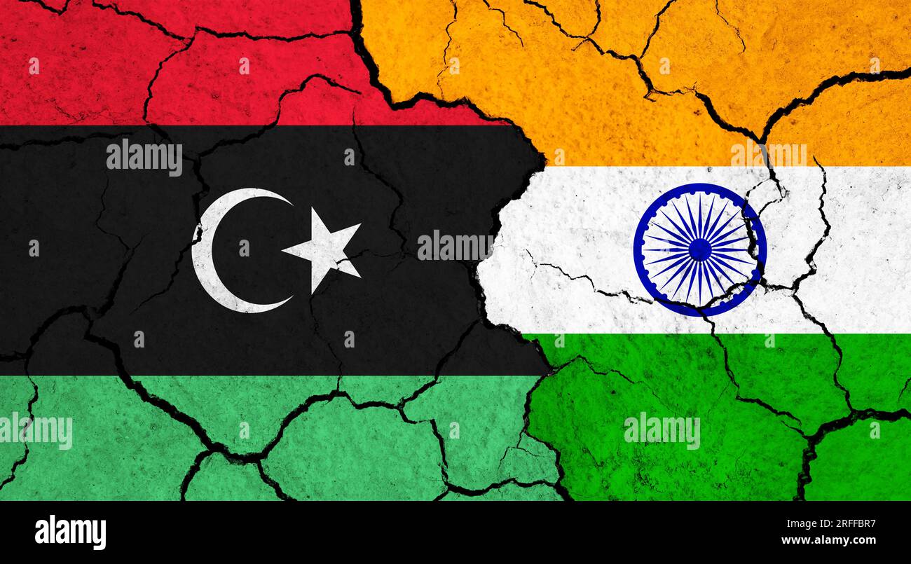 Flags of Libya and India on cracked surface - politics, relationship ...
