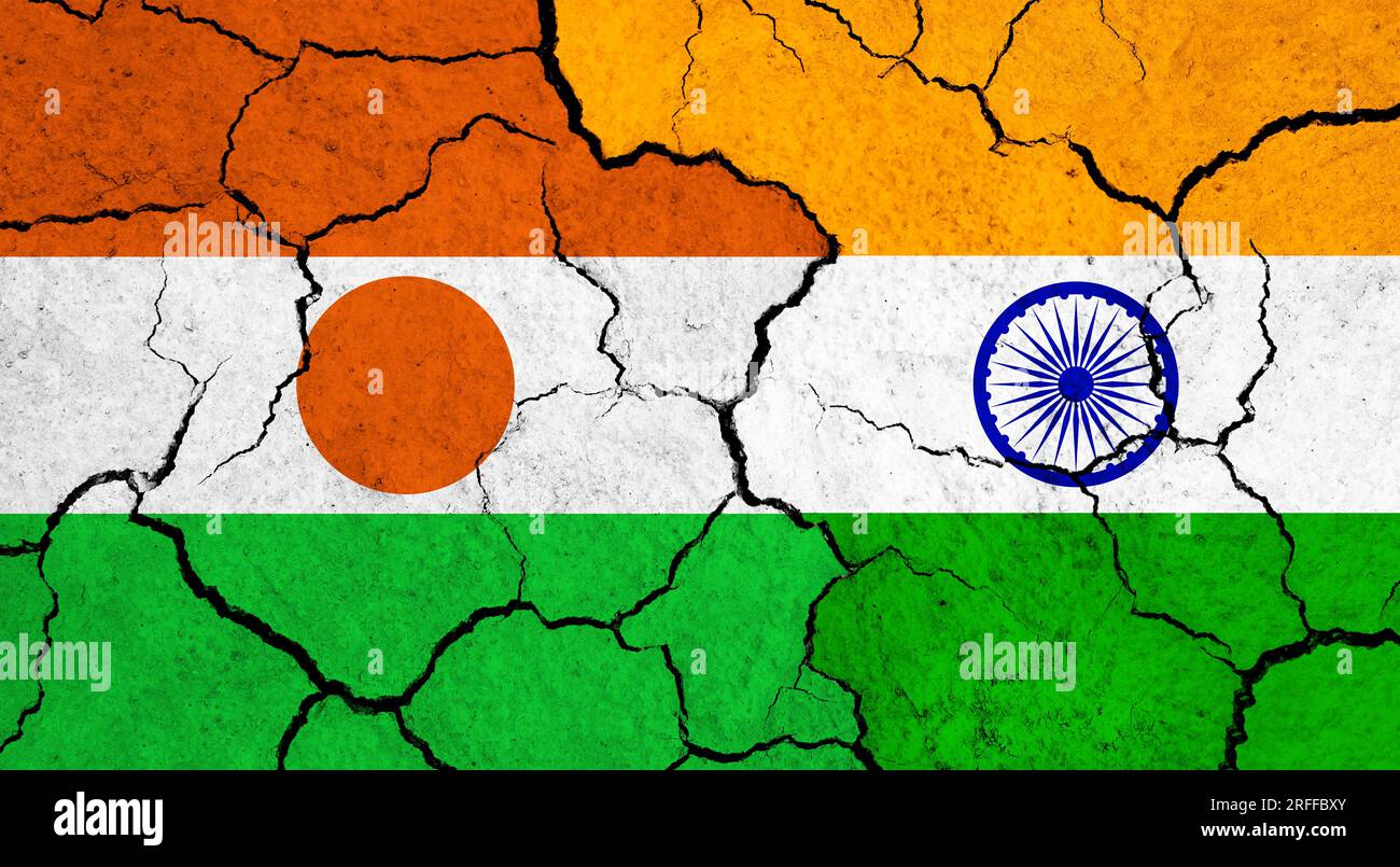 Flags of Niger and India on cracked surface - politics, relationship ...