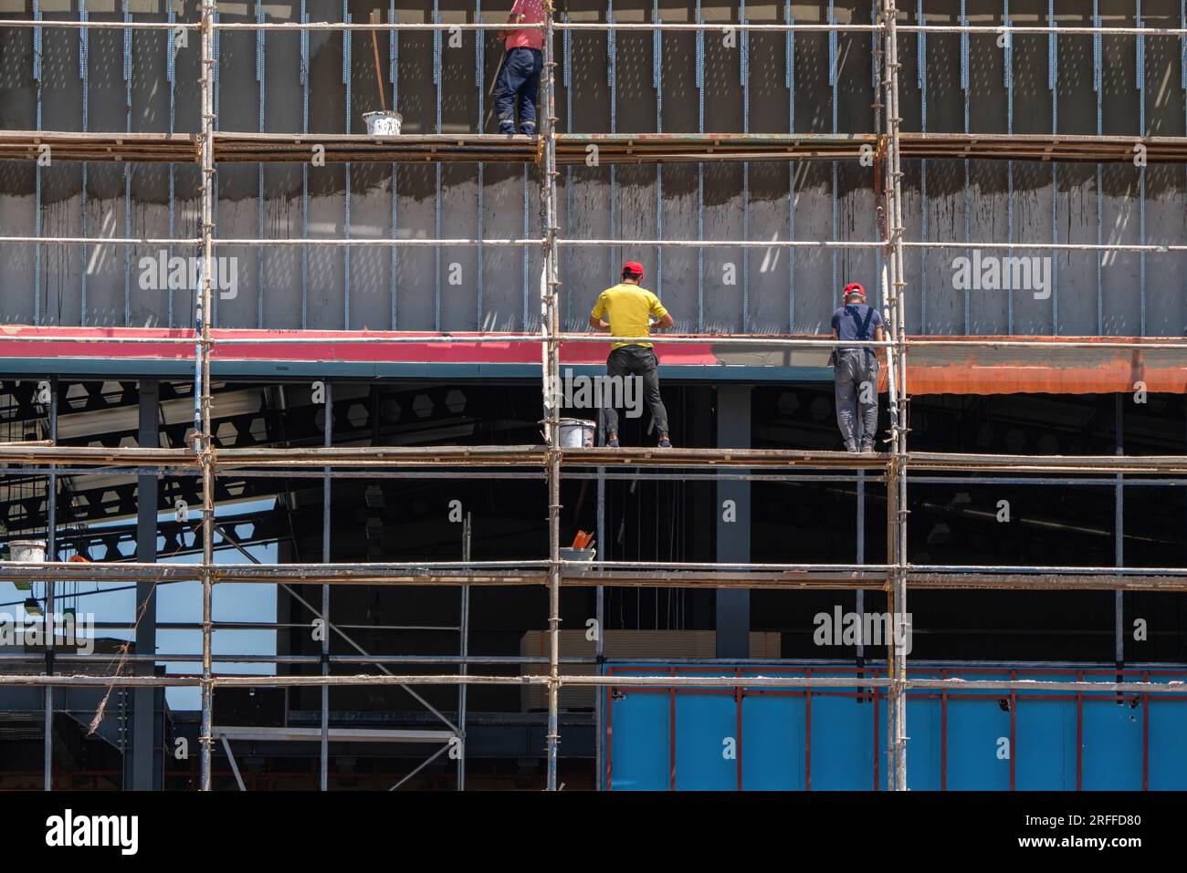 Workers on scaffolding at a construction site in Turkey Stock Photo - Alamy