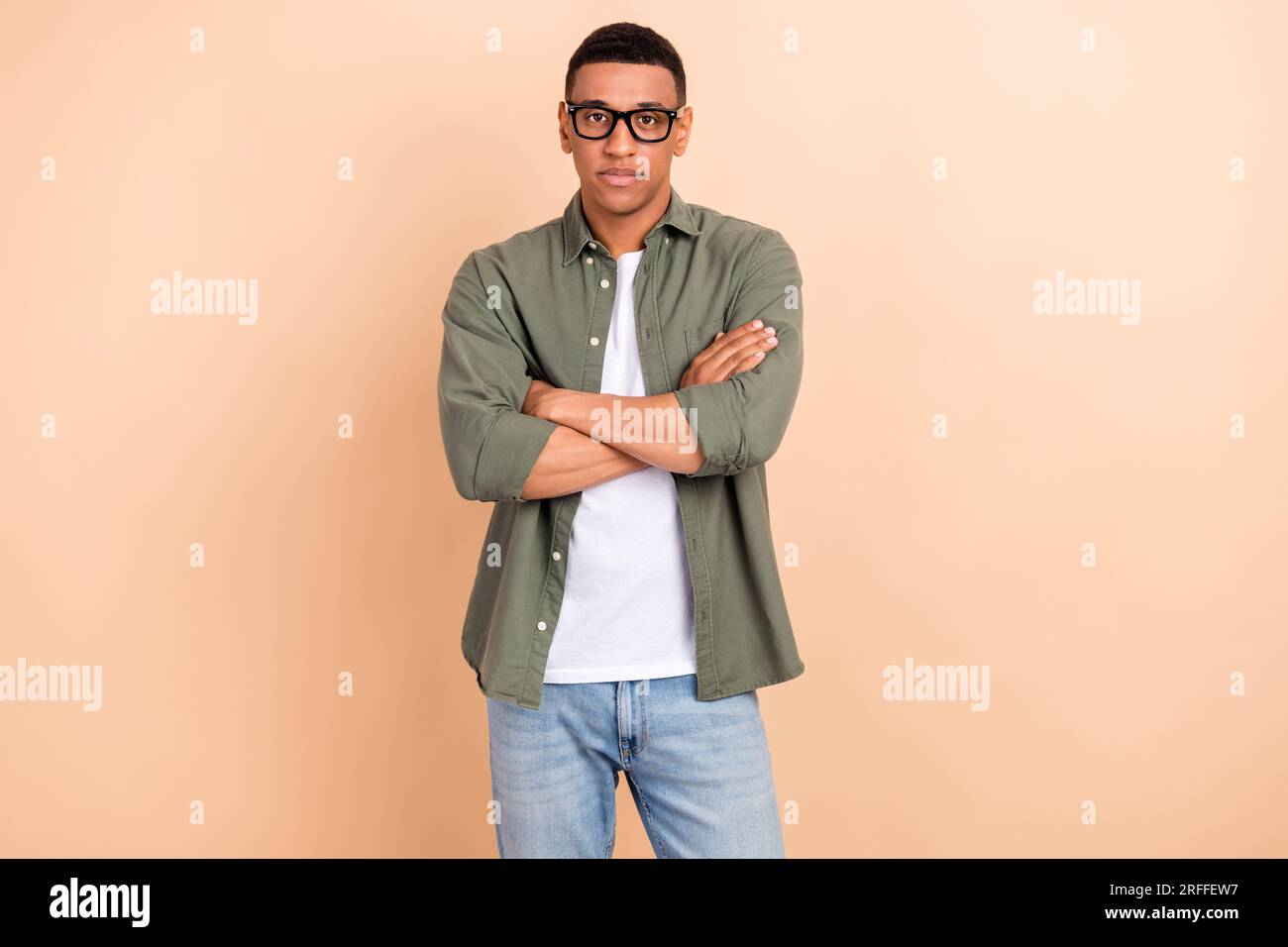 Photo of serious cool intelligent handsome guy dressed khaki shirt ...