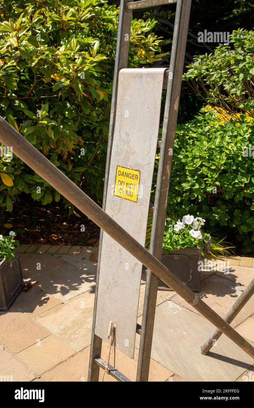 Ladder guard on scaffolding outside a house showing ladder, clamps ...