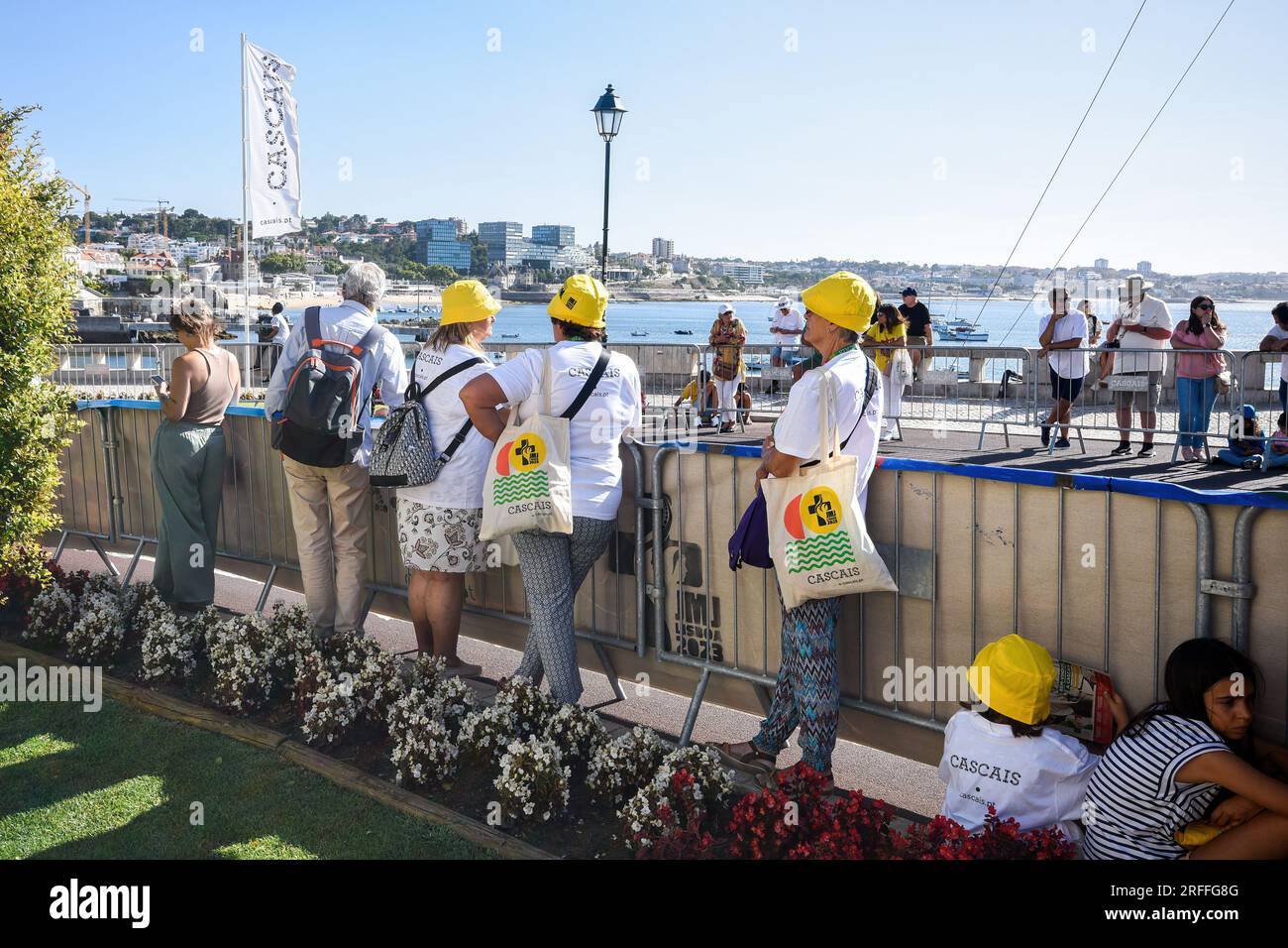 People next to a 3.5 km mural, the largest in the world, painted by the ...