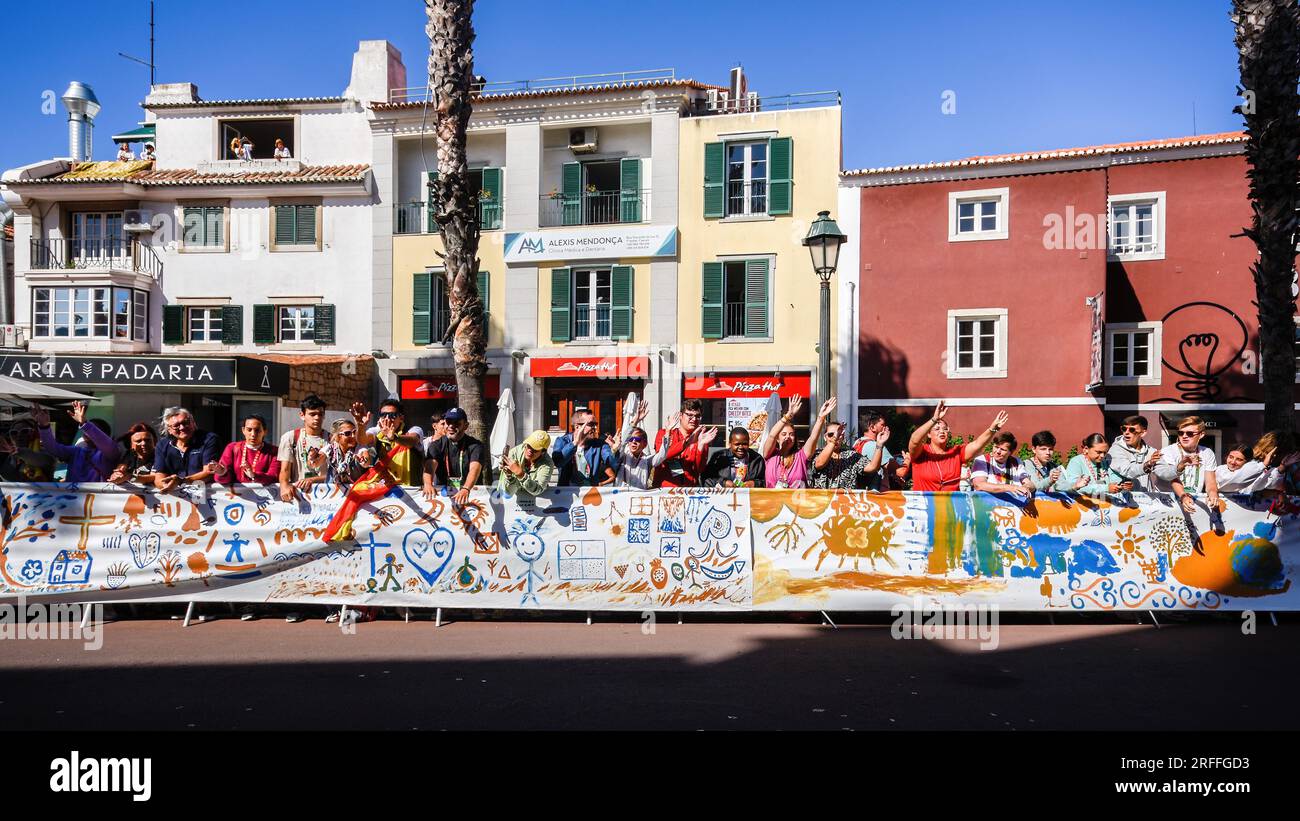 People next to a 3.5 km mural, the largest in the world, painted by the ...