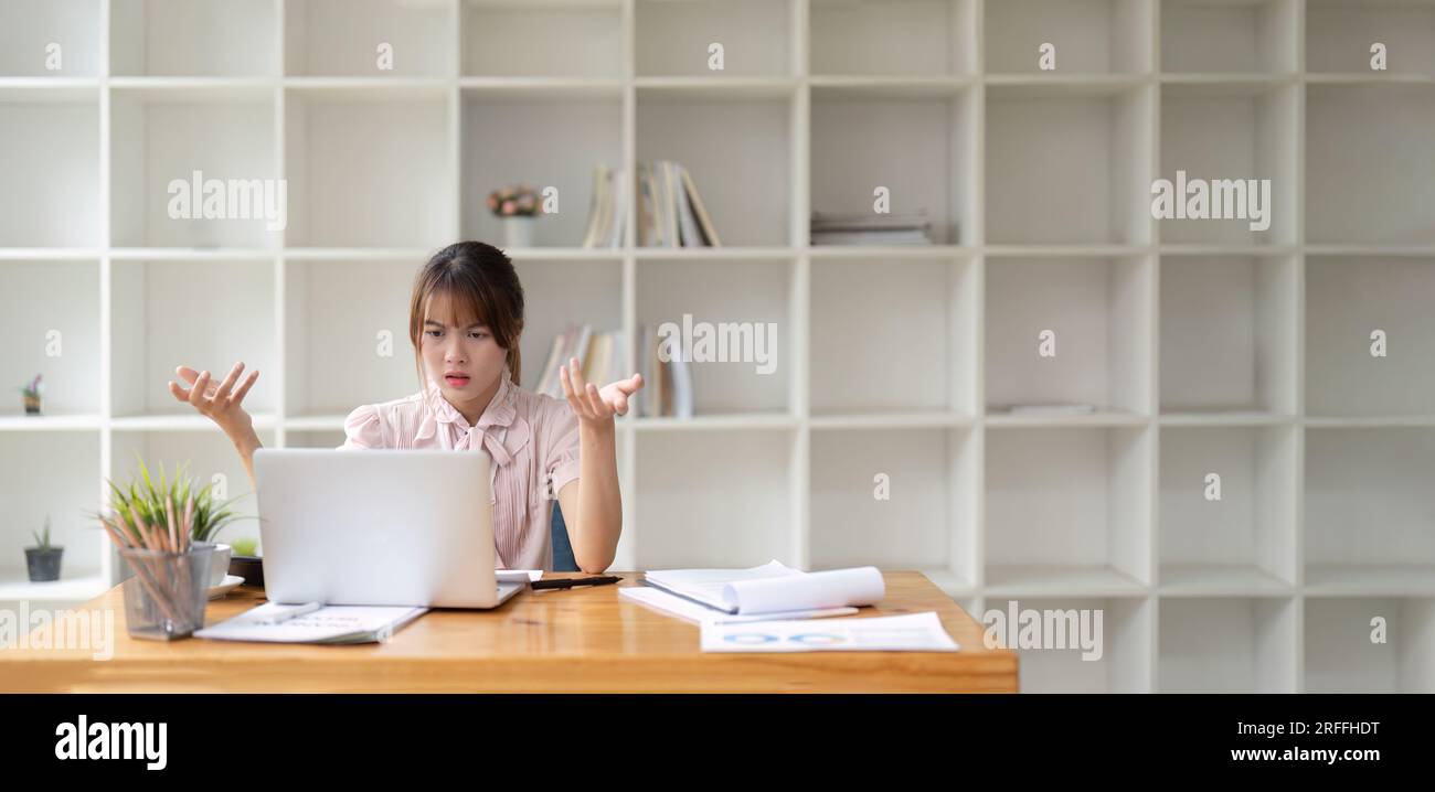 Asian business woman got stressed at work during in the office room ...