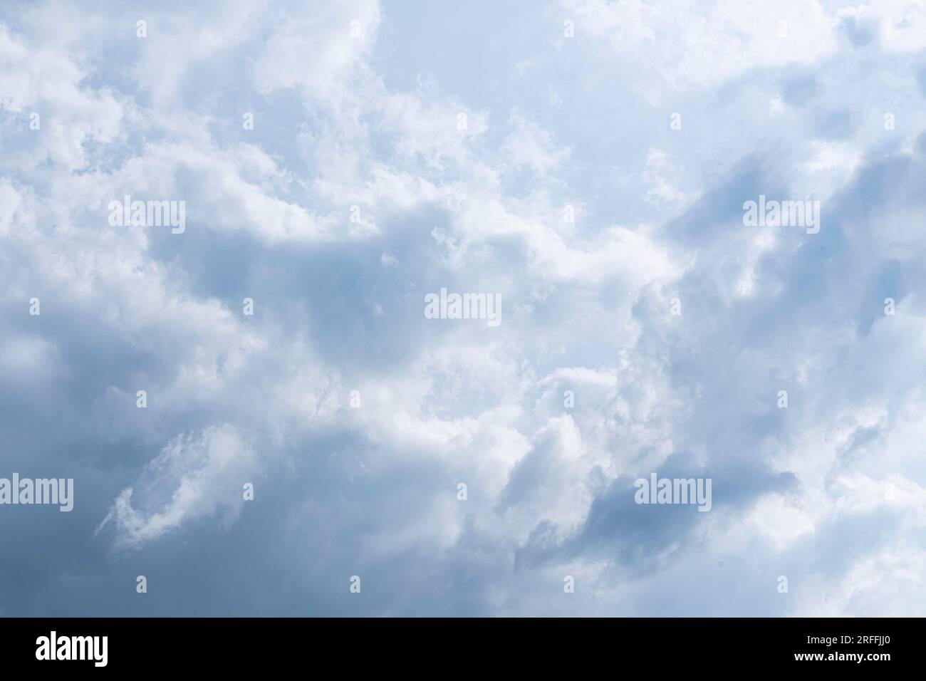 Sky background. Texture of clouds and sunlit sky Stock Photo - Alamy