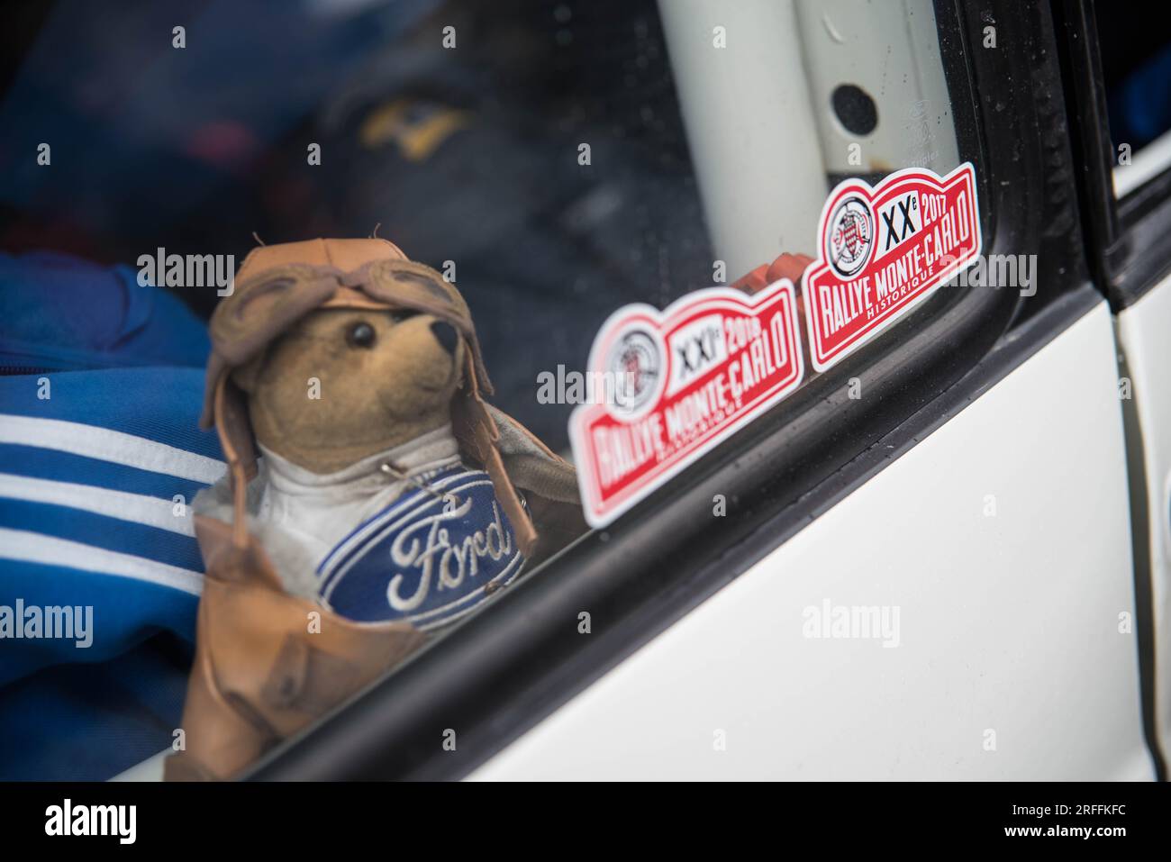 Rally race mascot in the window of a rally car participating the 2018 ...