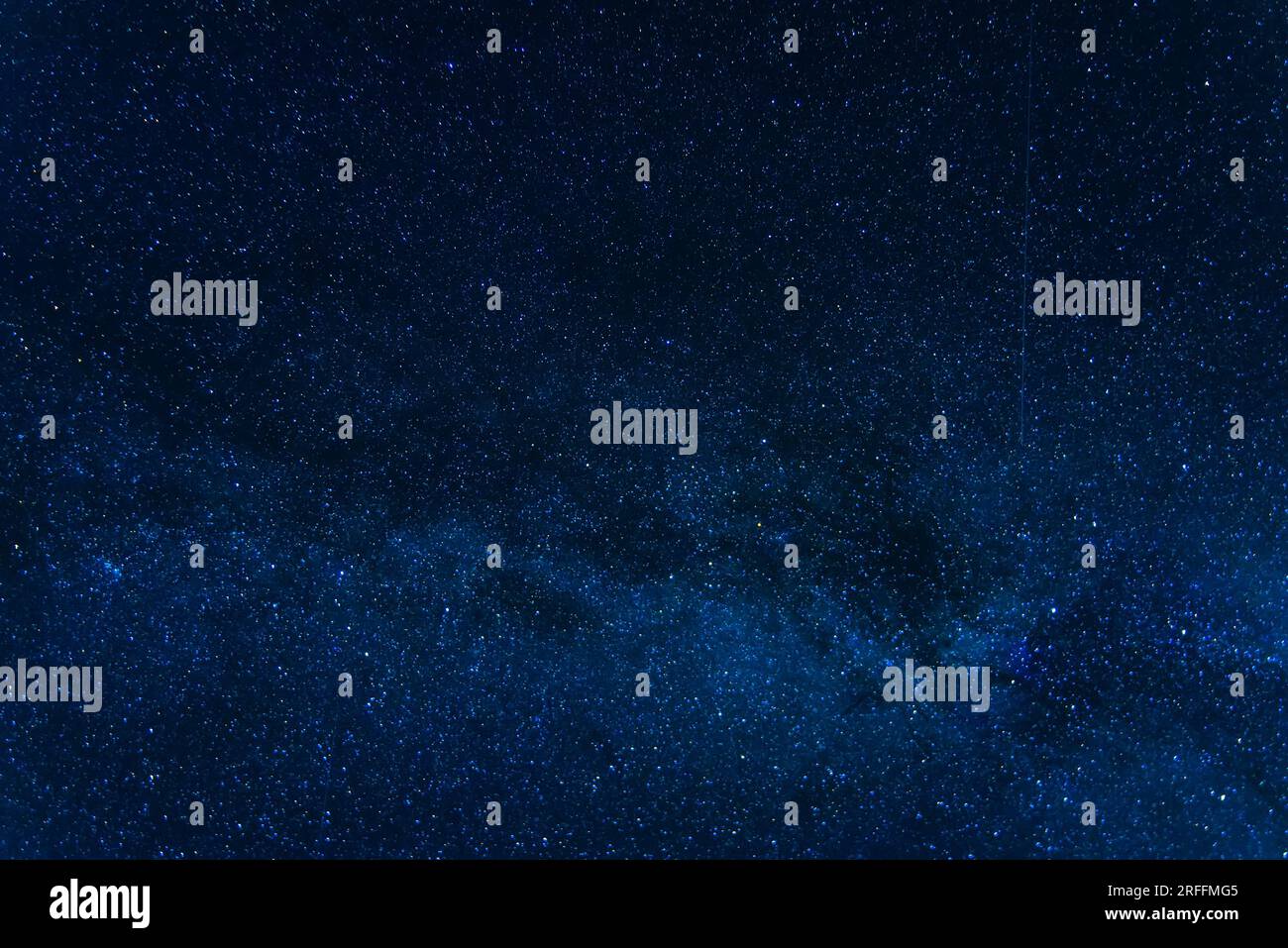 blue starry night sky with the milky way and galaxies. Astrophotography ...