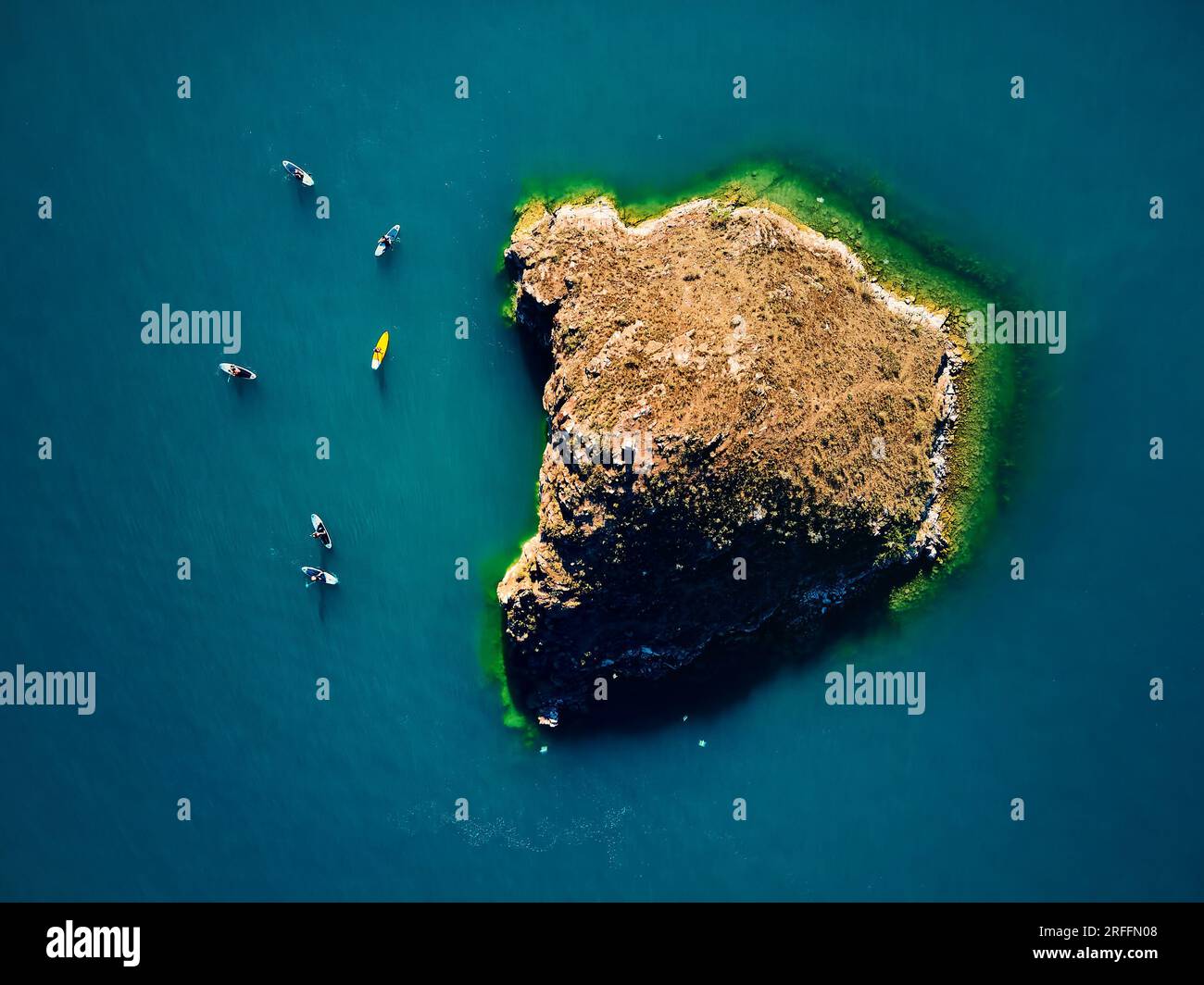 Aerial Top down drone shot of group people at stand up paddle boards ...