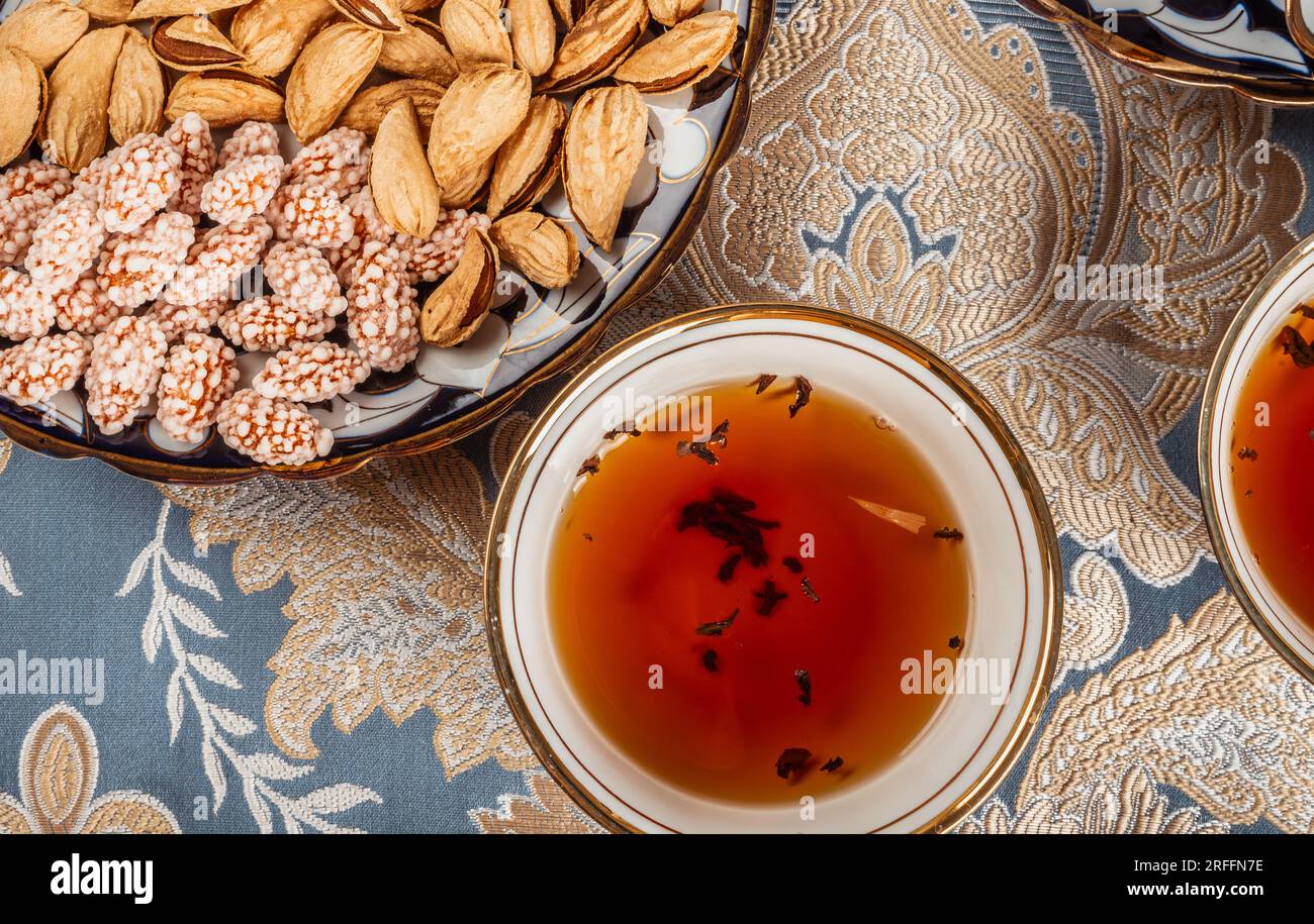 traditional uzbek tea with nuts Stock Photo - Alamy