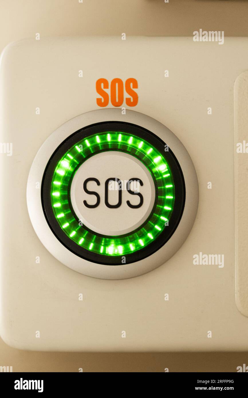 Emergency button with SOS text on the train Stock Photo - Alamy
