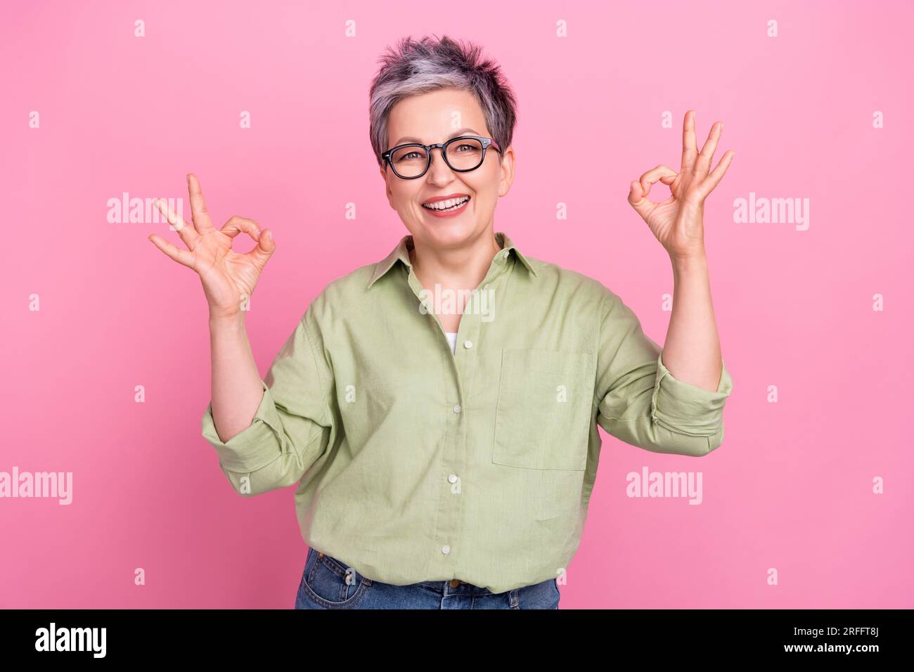 Photo of cheerful financier lady beaming smile arms fingers demonstrate ...