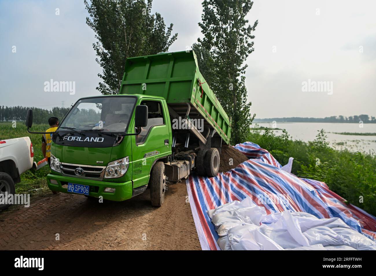 Tianjin, China's Tianjin Municipality. 3rd Aug, 2023. A truck transfers ...