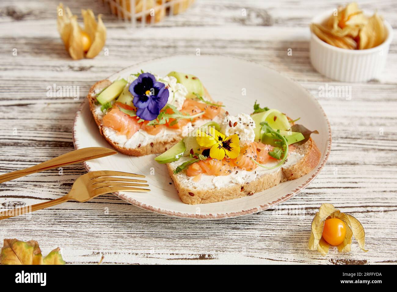 Aesthetic appetizer toasts with smoked salmon, arugula, avocado ...
