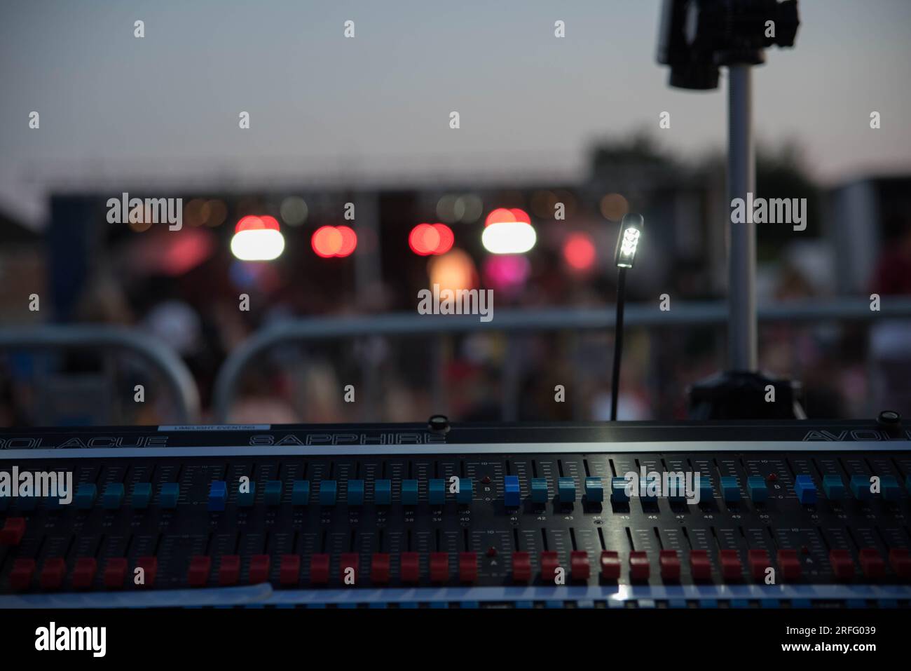 Sound desk at a music festival, looking out over the stage Stock Photo ...