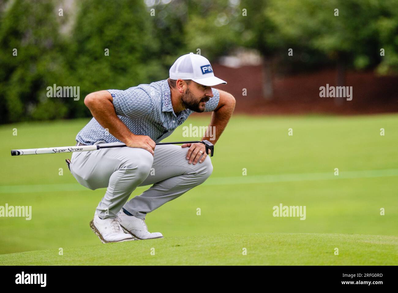 August 3, 2023: Stephan Jaeger checks his line on the ninth green ...